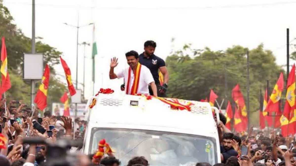 Policeman 'Welcomes' TVK Chief Vijay With Party Scarf On His Shoulders ...