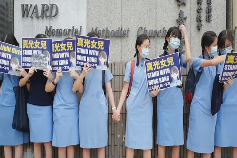 Thousands form human chains around Hong Kong schools