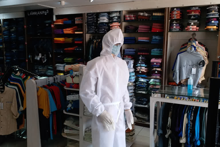 Mannequins wear PPE kits in new normal